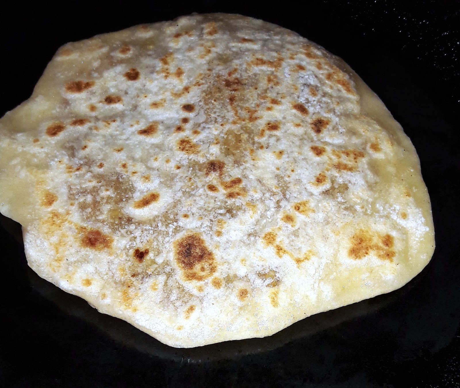 Vedai Cuisine: COCONUT POLI / THENGAI POLI