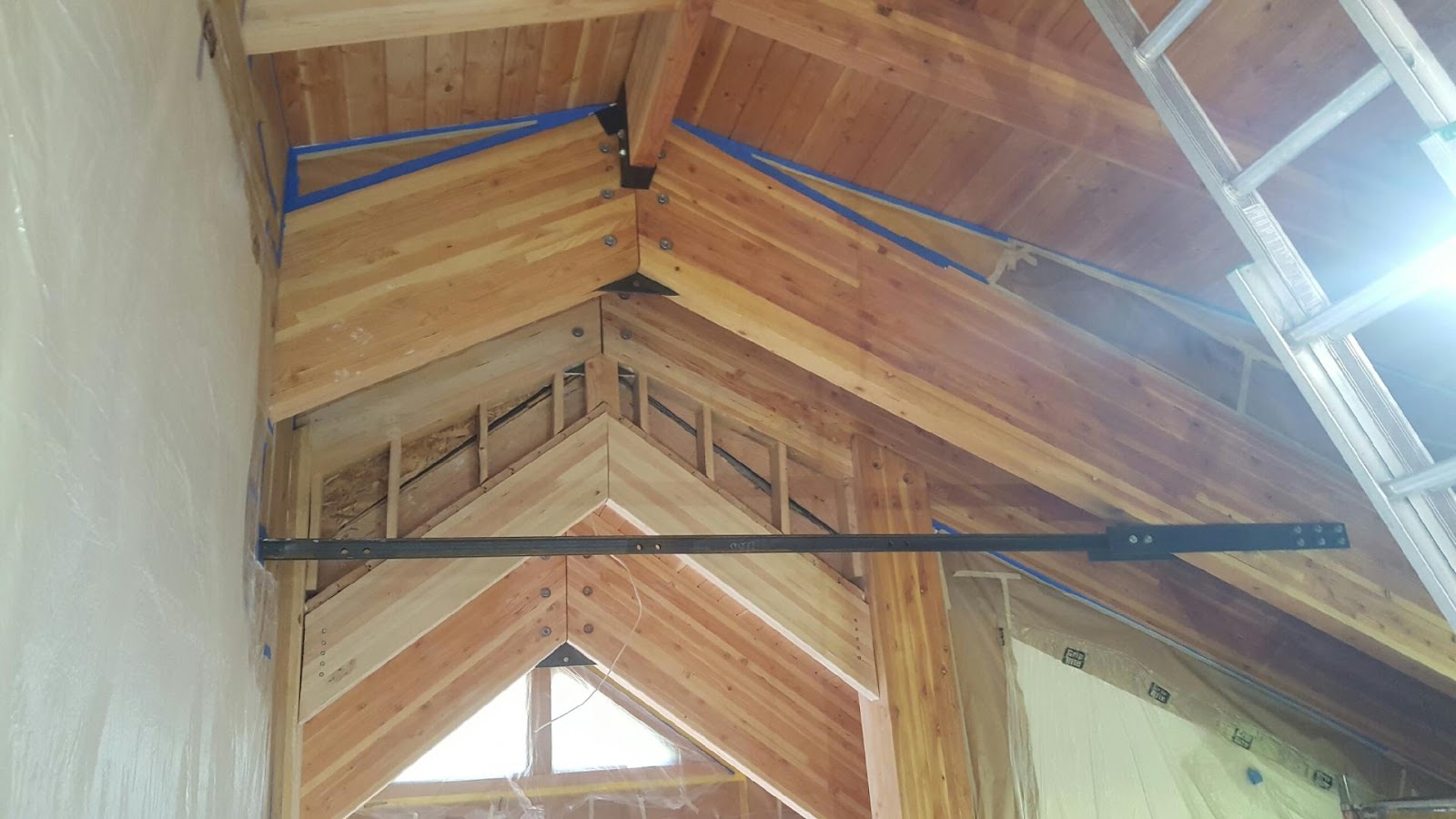 CCM Architecture : : Construction: Clear coating the car decking and beams