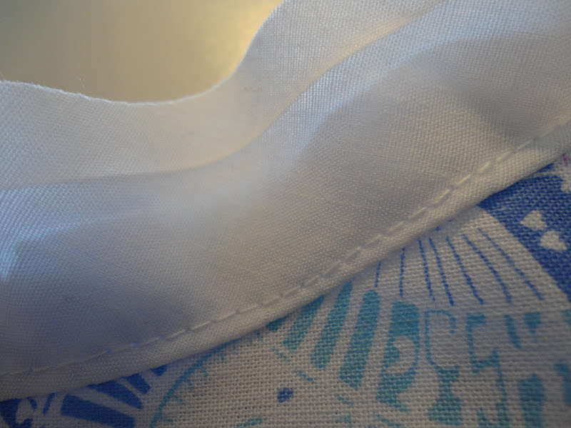 Whoever has the most fabric, etc...: How to Use Bias Binding to Face an ...