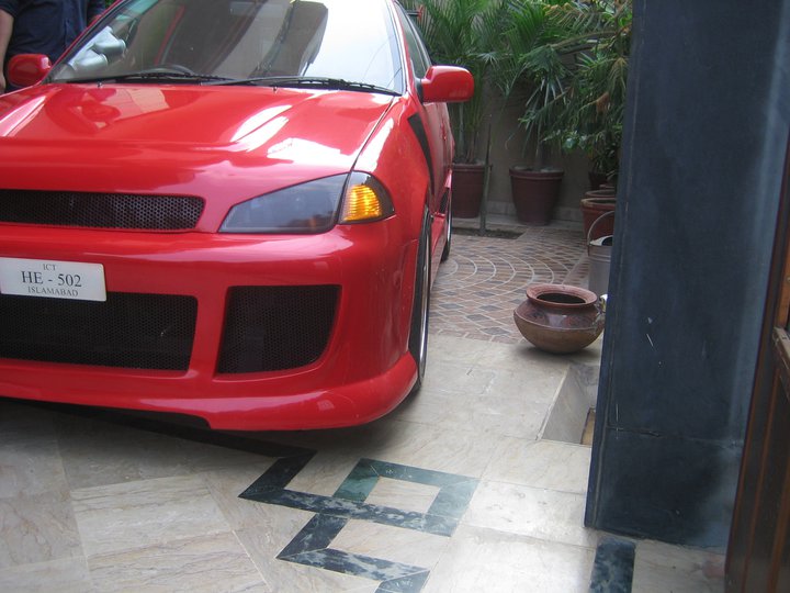Riders Meeting: Modified Suzuki Cultus 2011 in Red and Black Color