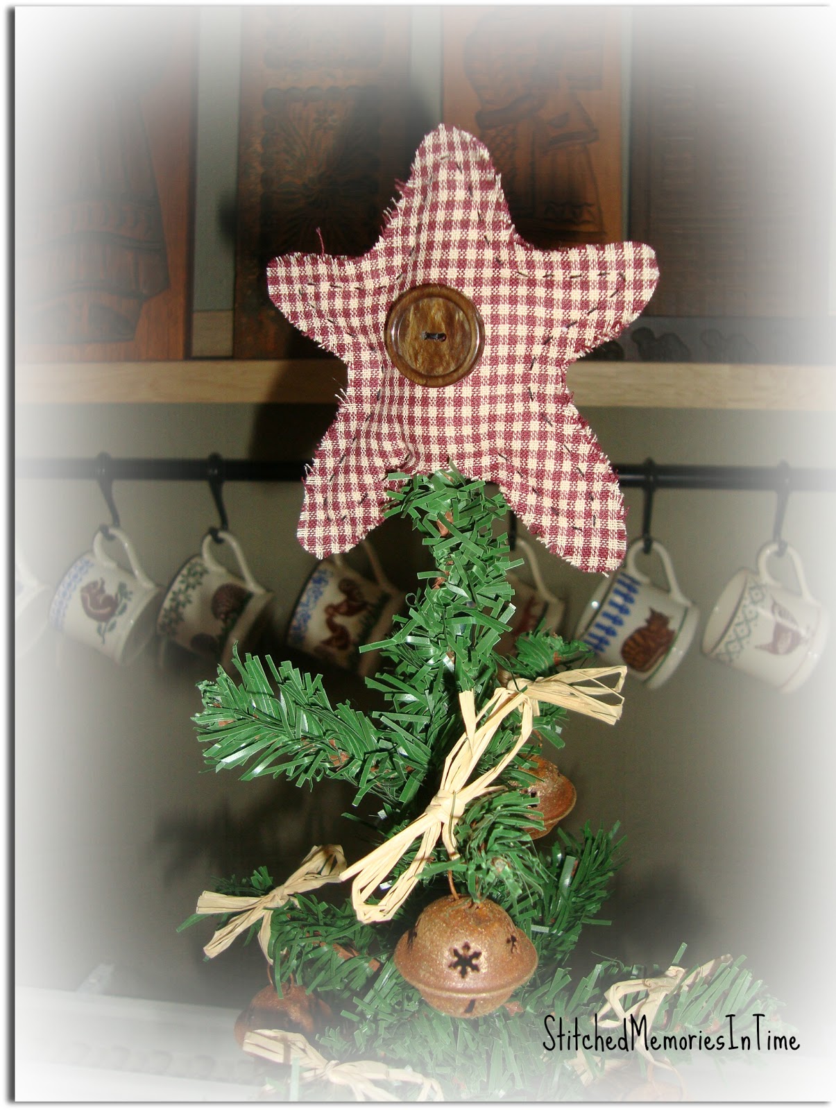 Stitched Memories in Time: A Primitive Christmas tree.....