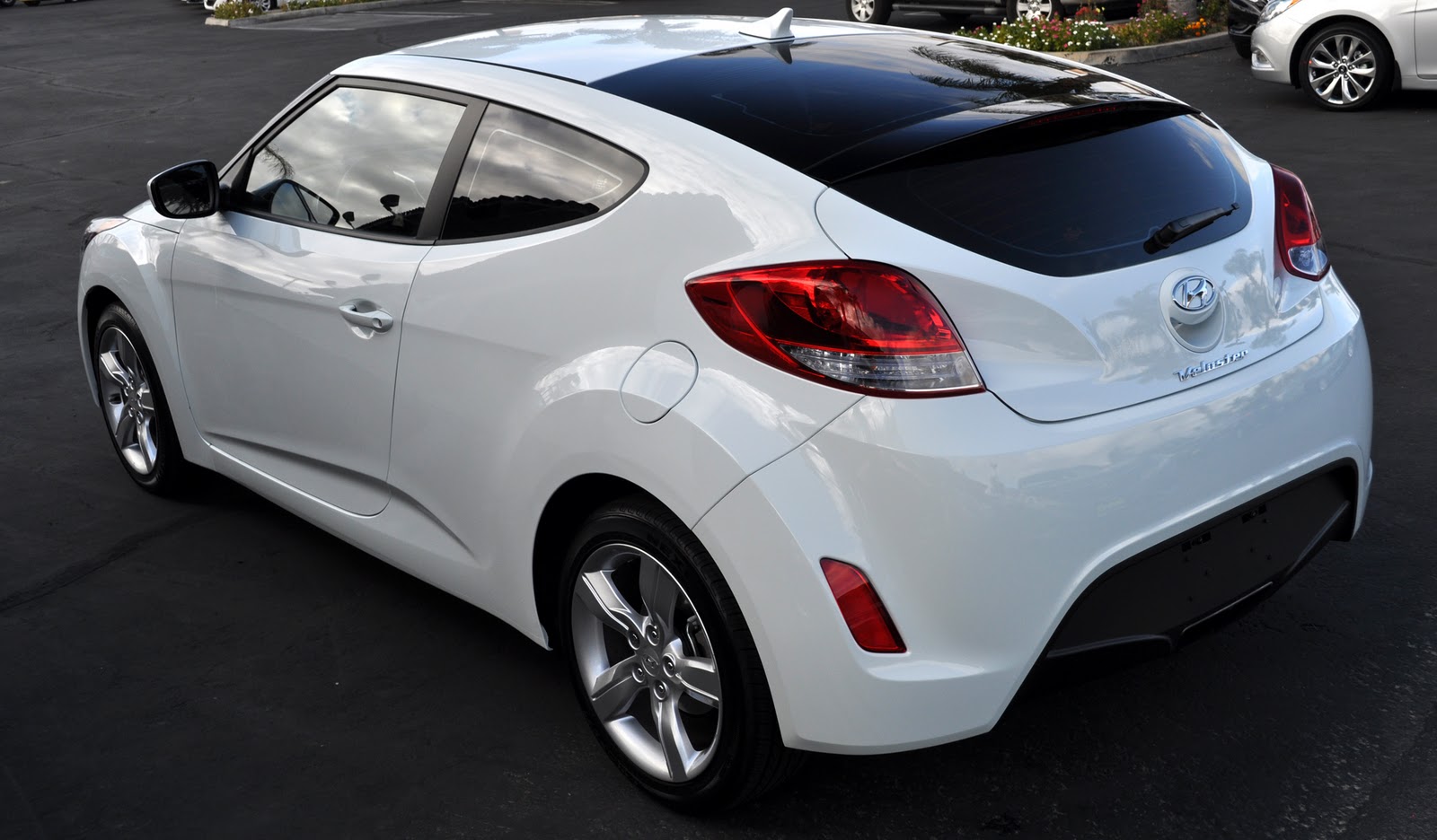 Just A Car Guy: Veloster, made by Hyundai... the drivers side looks ...