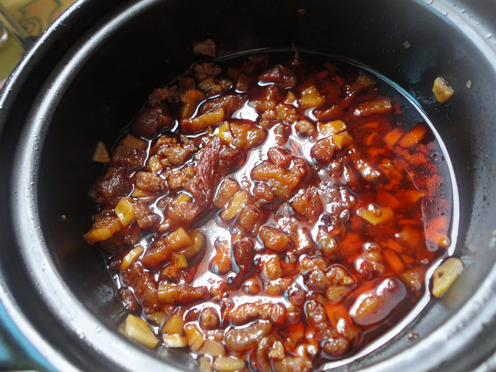 “Kho quet” (Poached pork belly with fish sauce) – a delicious humble ...