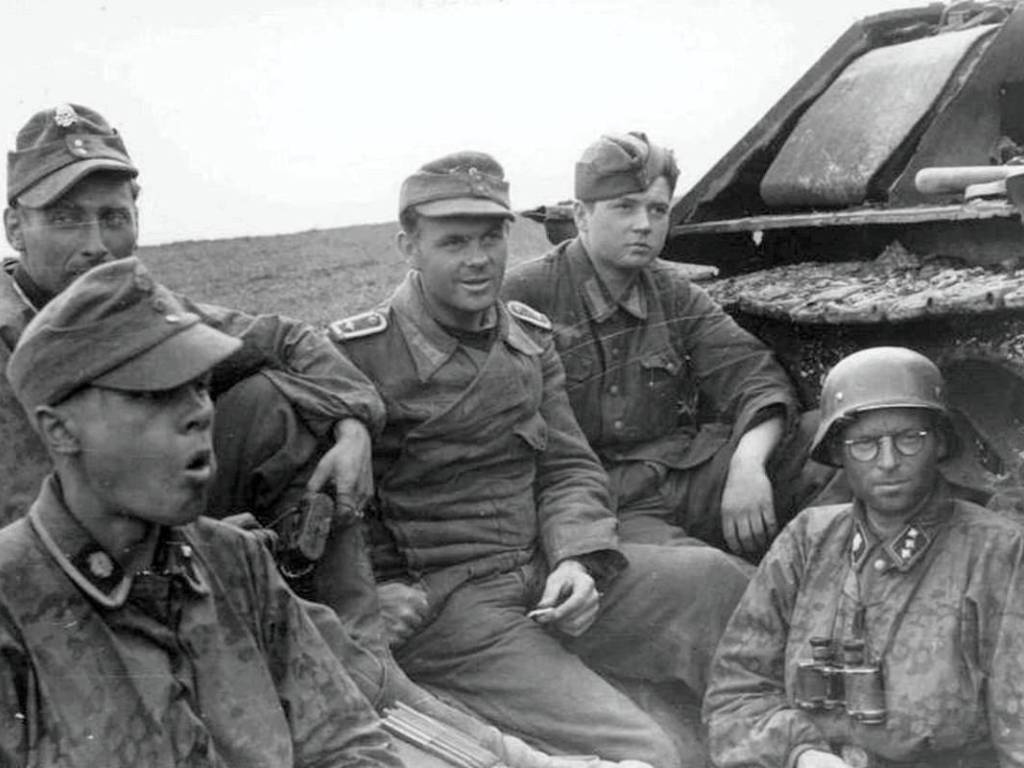 Panzermänner: Totenkopf and Heer Officers Reading Telegram Together