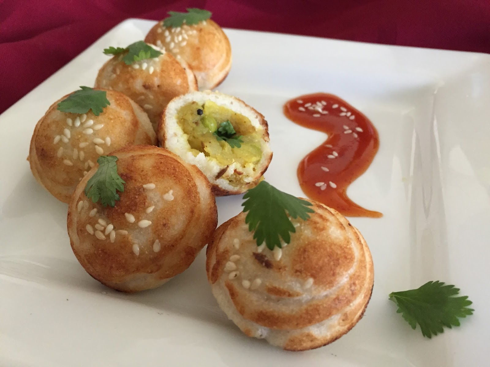 The Sizzling Pan: Spicy potato masala 'stuffed' appe