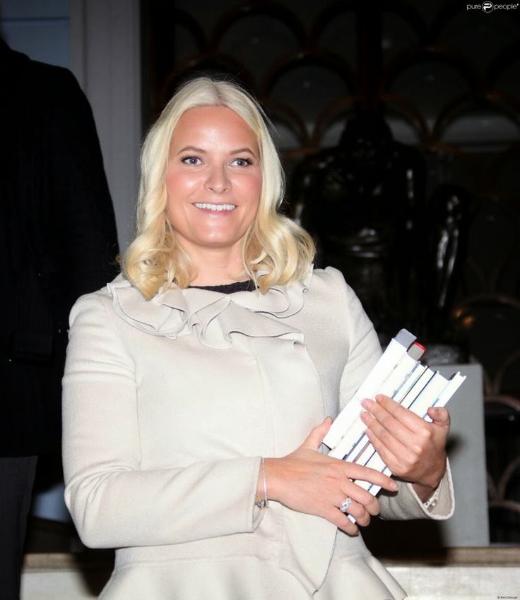 Crown Princess Mette Marit visits Too Young to Wed exhibition