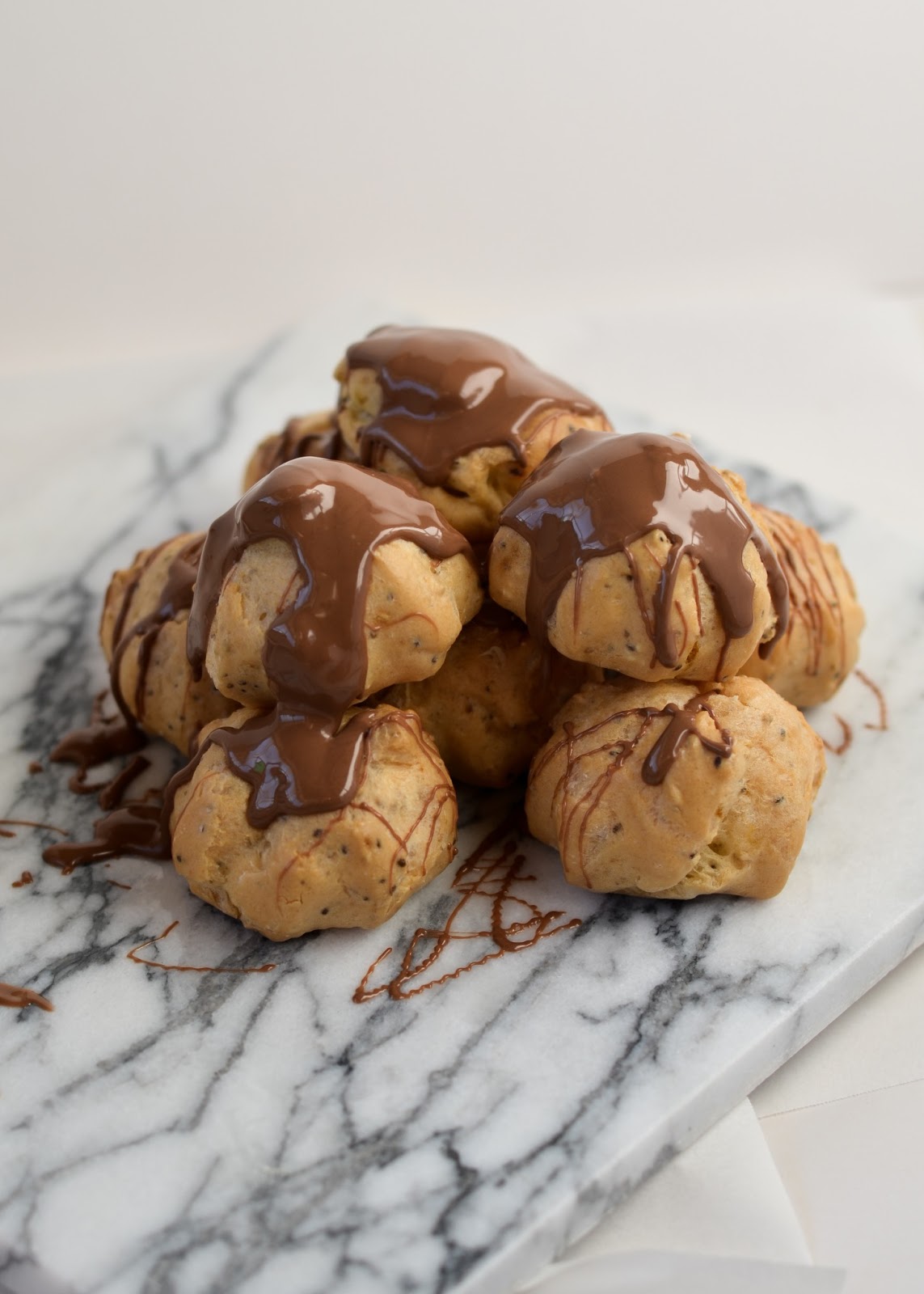 Cold comfort/-/ Lemon and poppy seed Puffs with lemon curd and whipped ...