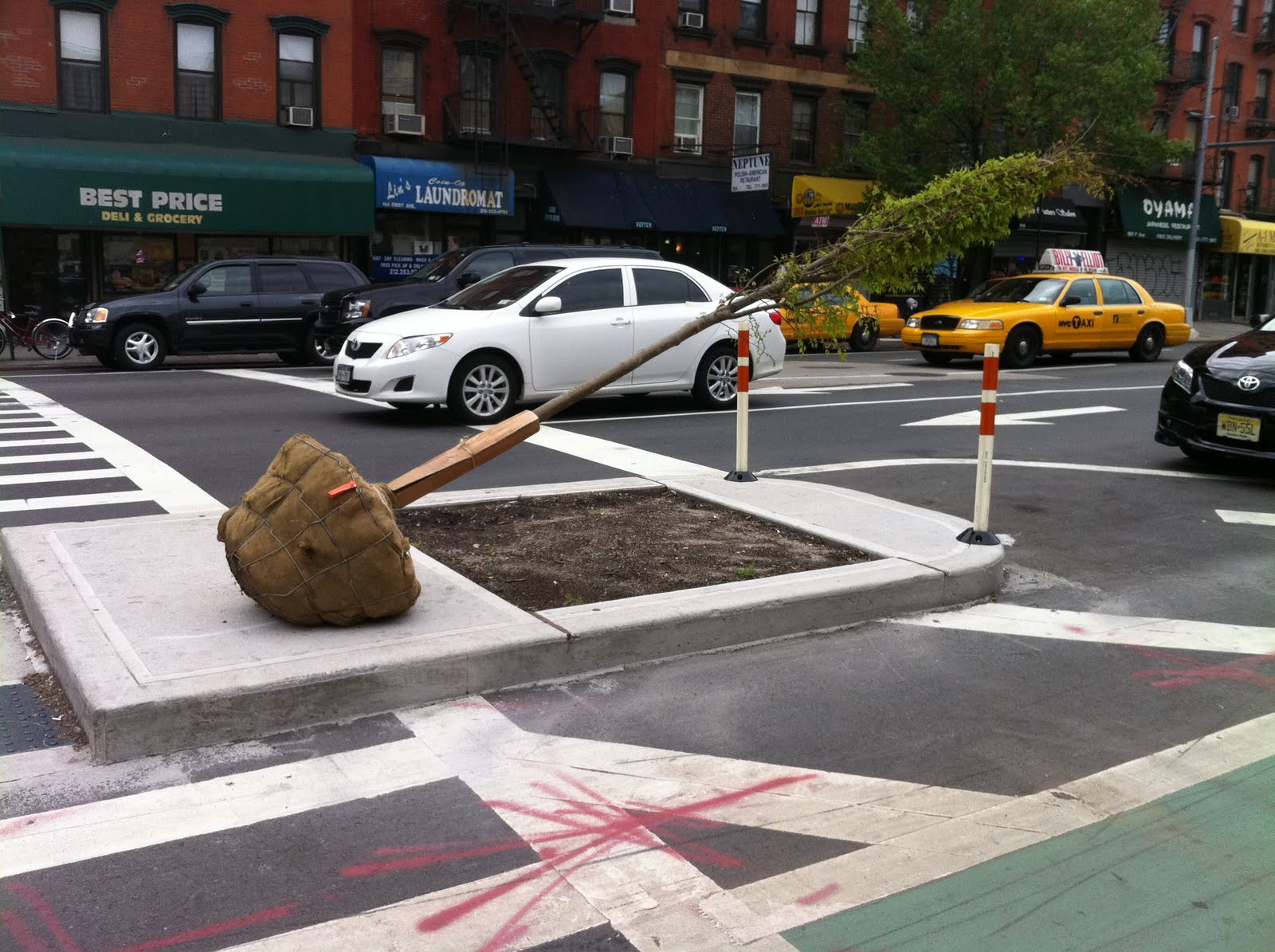 EV Grieve: Breaking: First Avenue bike lane buffers getting buffed up ...
