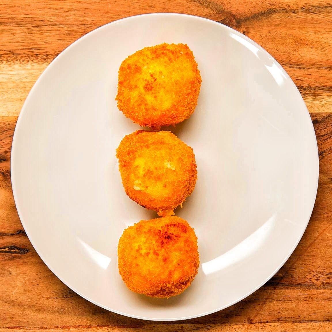 Pesto and Mozzarella–Stuffed Risotto Balls