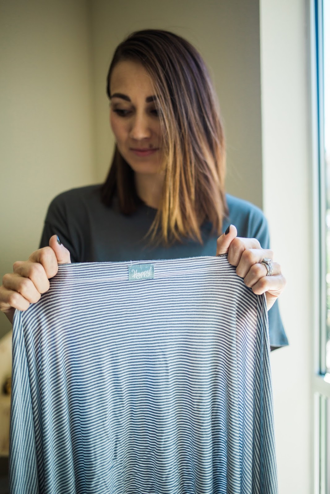 Find the tag on the center of the wrap.