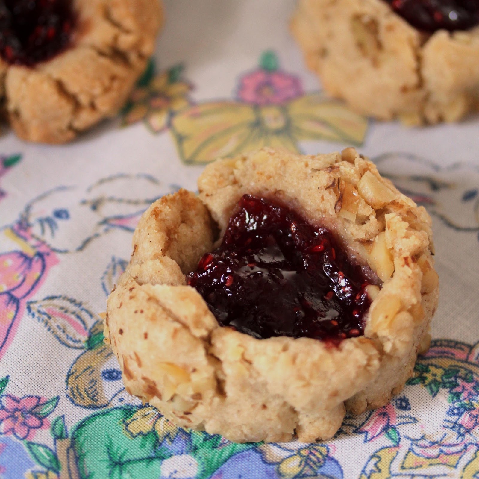 Raspberry Walnut Thumbprint Cookies | Kitchen Grrrls.