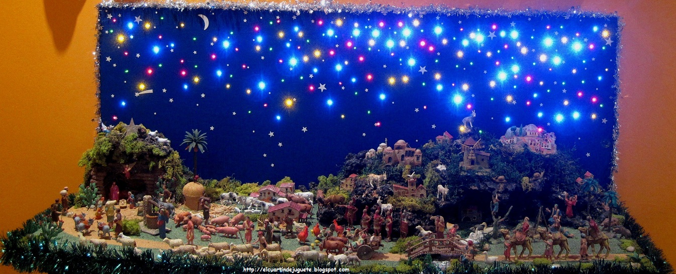 El cuartin de juguete: Nacimiento Pech y estrellas adhesivas fluorescentes.