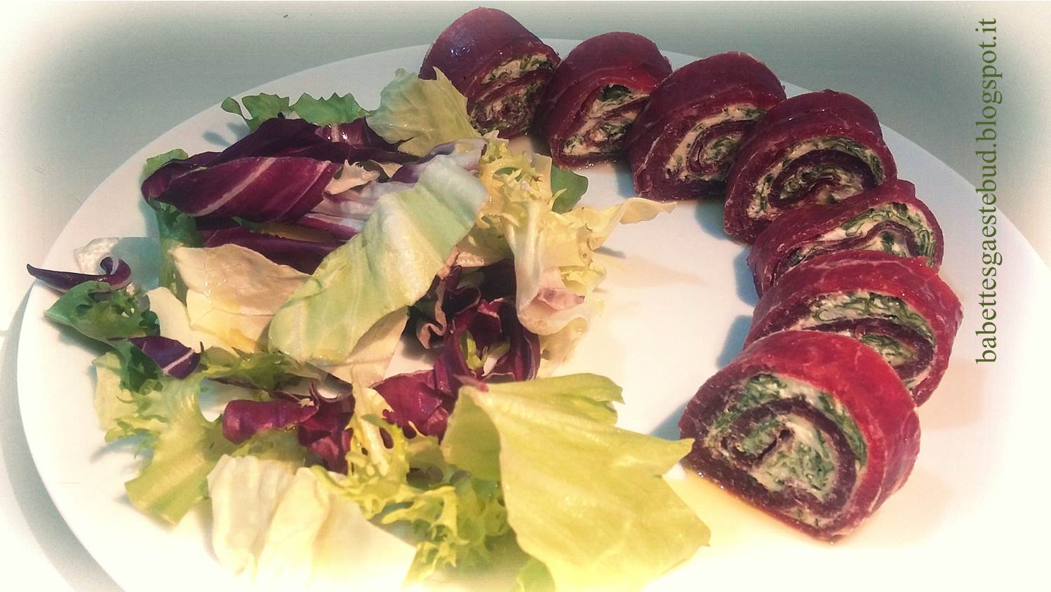 Babettes gæstebud.: Bresaola rolls with rocket and caprino cheese filling