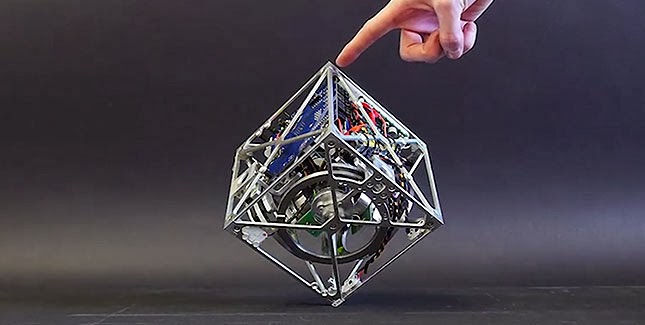 A Magic Gravity Defying Cube that Can Jump, Balance, and Walk across ...