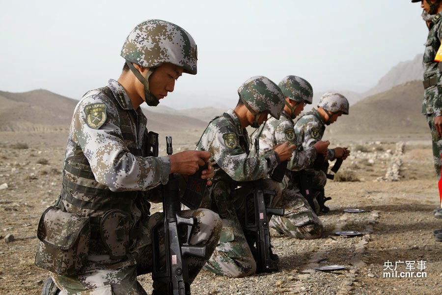 Asian Defence News: Chinese PLA cadres weapons