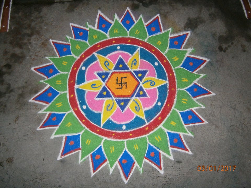 CHODAVARAMNET: SWASTIK SUN FLOWERS RANGOLI ART