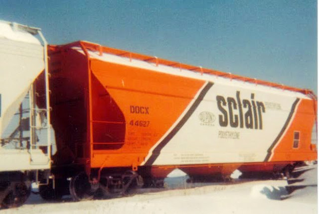 Trackside Treasure: DuPont SCLAIR Covered Hoppers