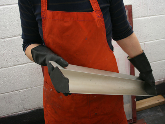 Exposed: Coating a screen.