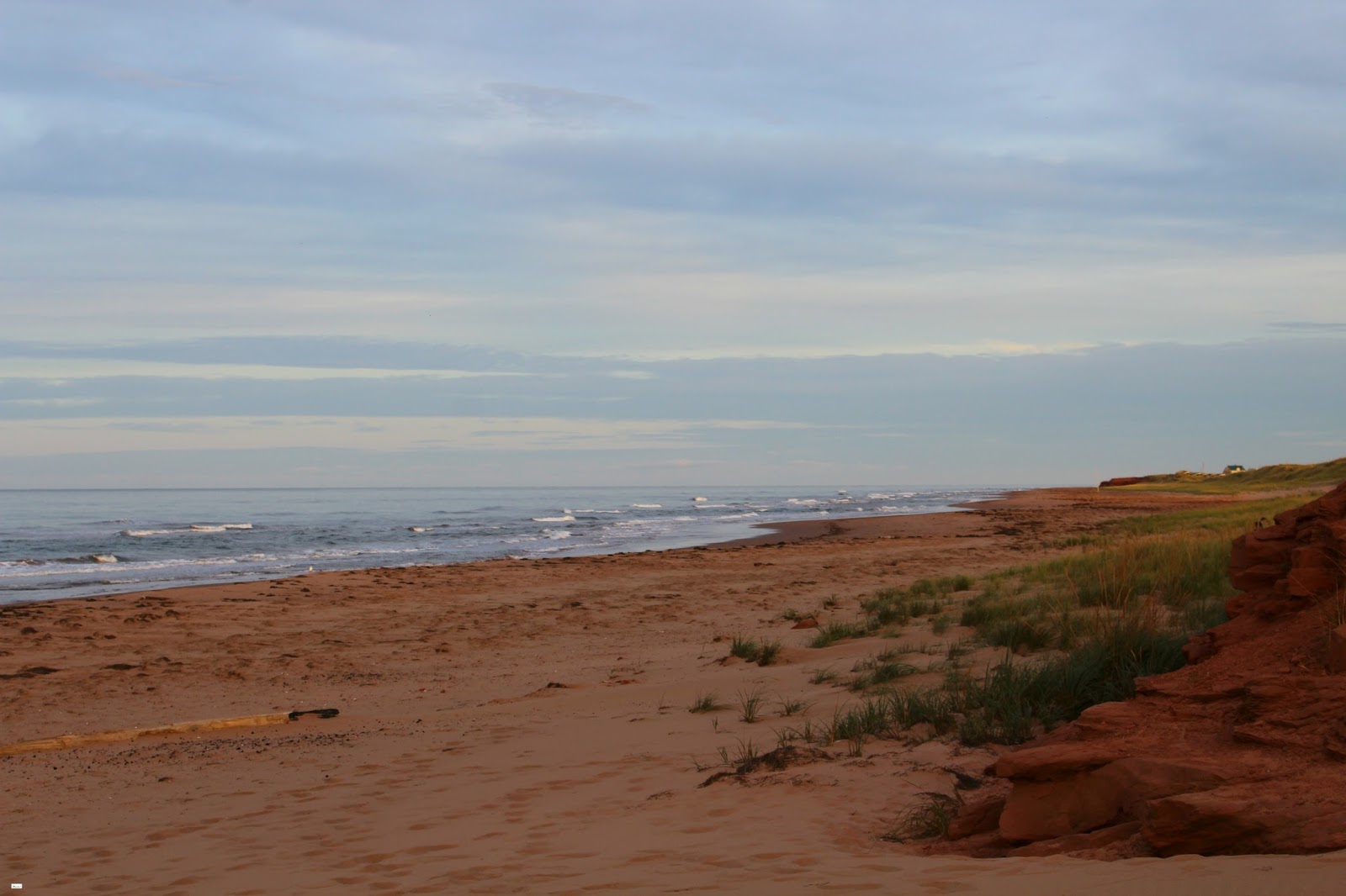 A Walk on the Beach Beside the Rugged Cliffs on Prince Edward Island ...