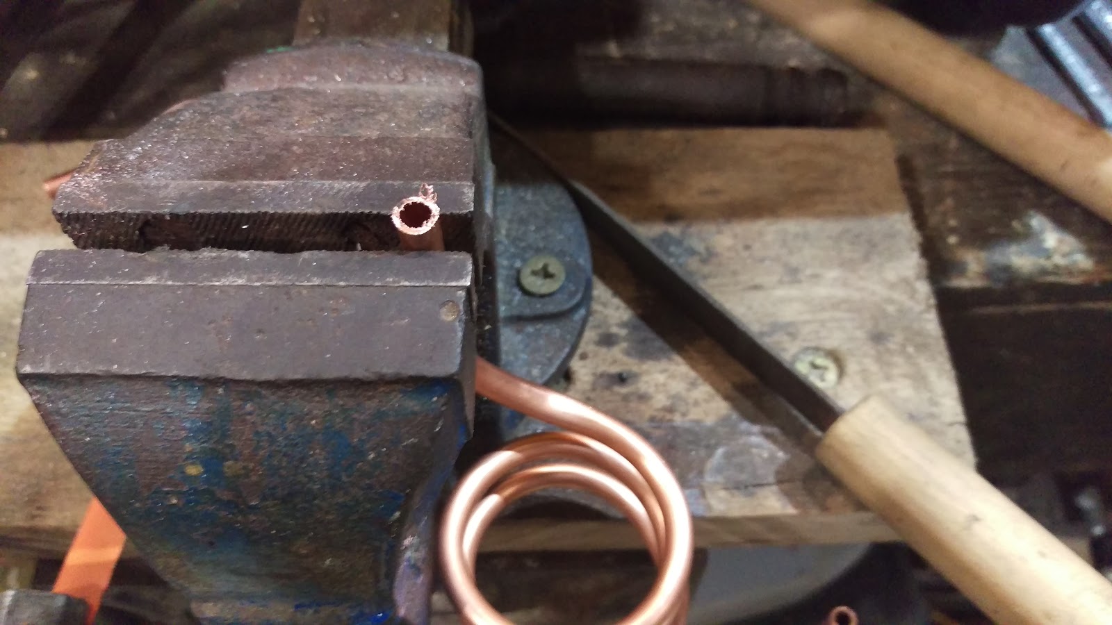 Amelia Squariel: Charlie's Shed - Curly copper fuel pipe