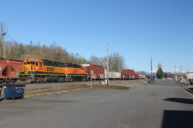 Railfan in Sumas, WA: sunny, BNSF switchers 2100/GP38-2 and 2880/GP39M, 11:30am...22 Feb, 2016