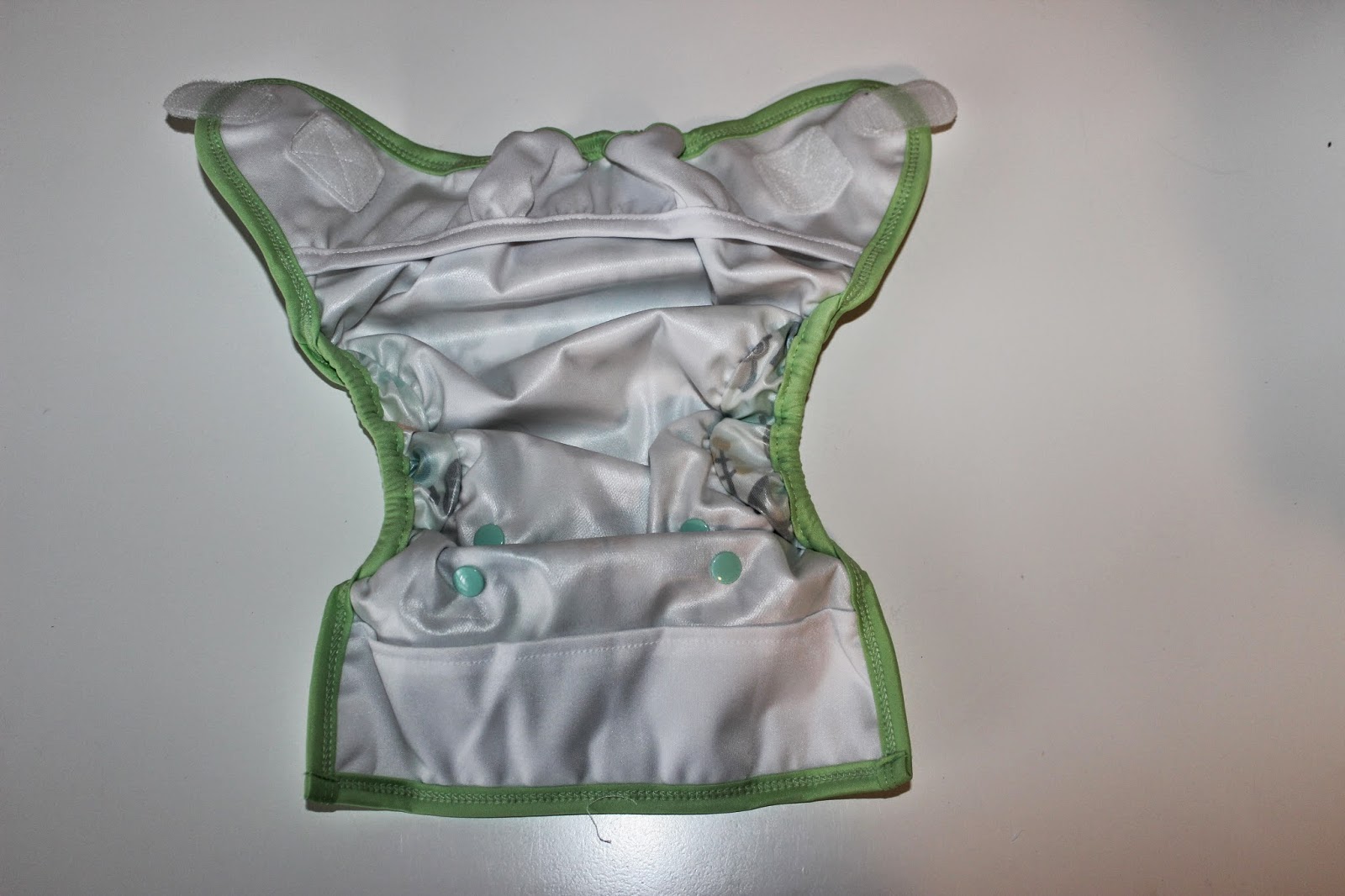 Trying To Go Green: Nuggles Cloth Diapers & Tuck Wrap Go Cover Giveaway ...