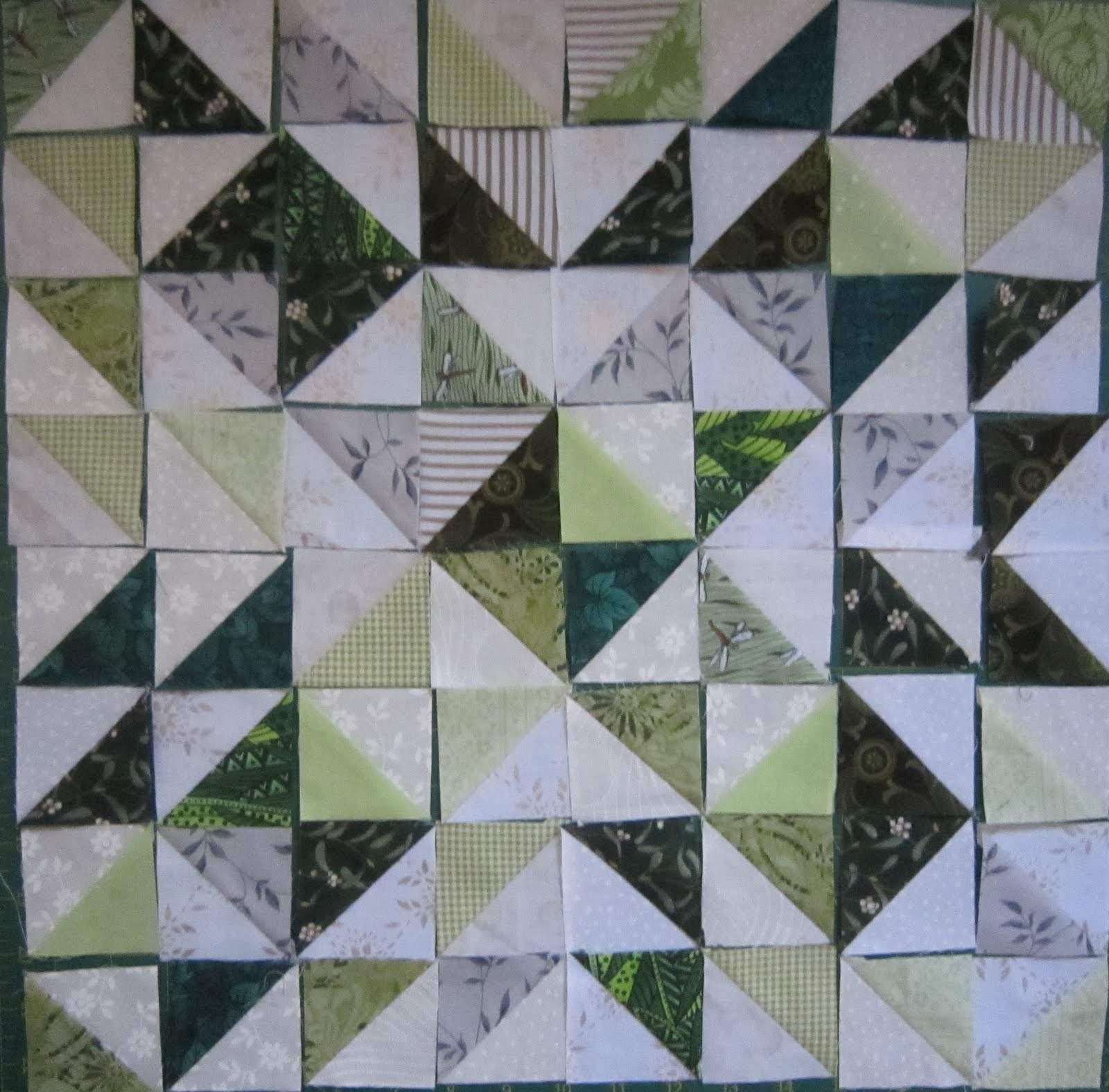 Chicky Quilts: New project - green 1/2 square triangles
