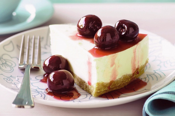 White choc cheesecake with port syrup cherries recipe | LEBANESE RECIPES
