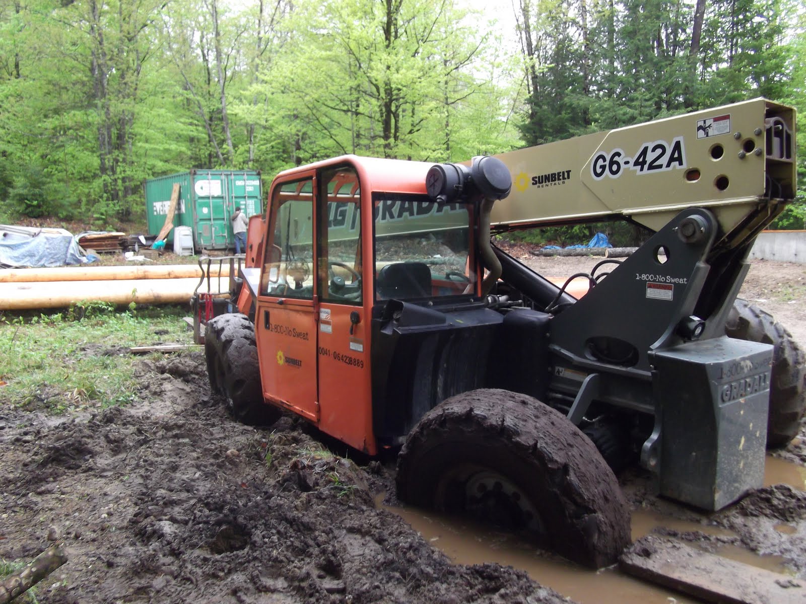 Bob Loblog's Log Blog: Telephone poles, telescoping forklift, and mud!