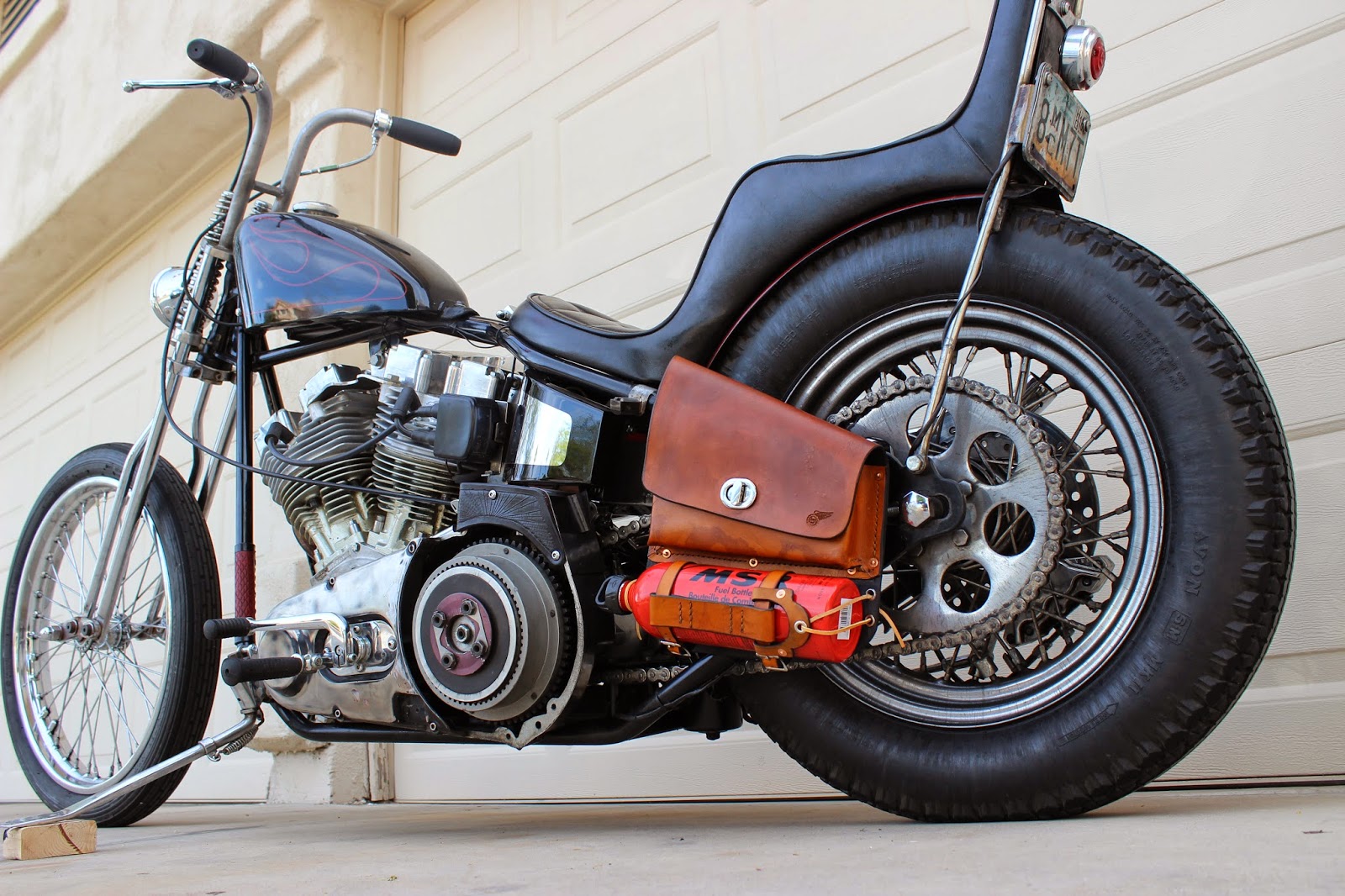 American Leather Werk: rigid left side chopper tool bag with fuel bottle