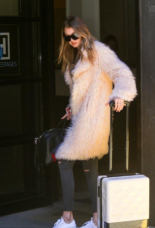 Gigi Hadid Travels Chic Carry-On Luggage | Fashion Blog by Apparel Search