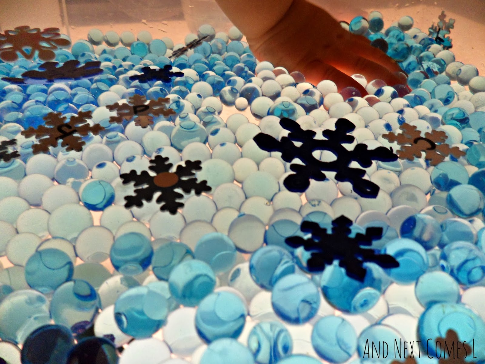 Winter Sensory Table Idea with Water Beads | And Next Comes L ...