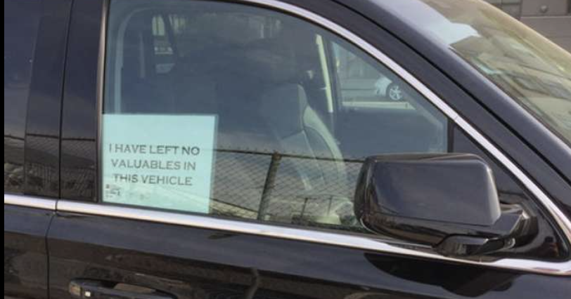 Does placing a 'no valuables inside' sign in a car window deter break ...