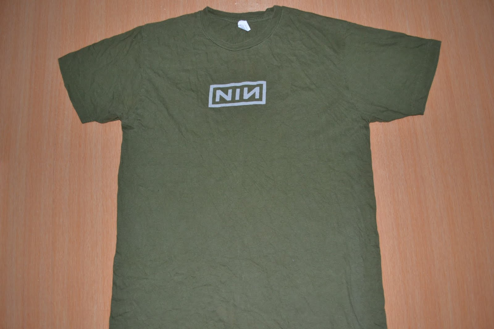 Anyone have any new(ish) size medium NIN shirts they feel like selling ...