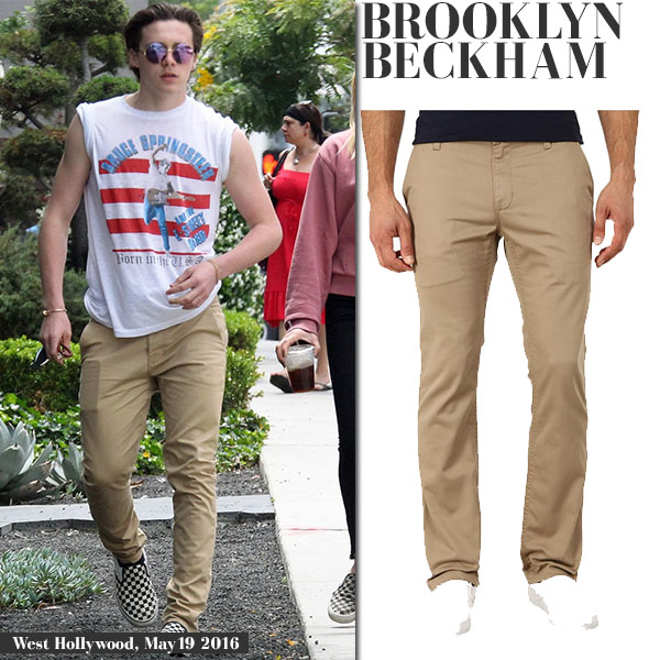 Brooklyn Beckham in khaki chinos and Bruce Springsteen tour t-shirt