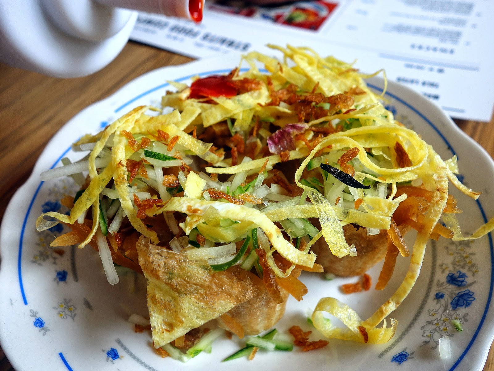 Straits Food Company's menu is nearly identical to Baba Low's, with ...