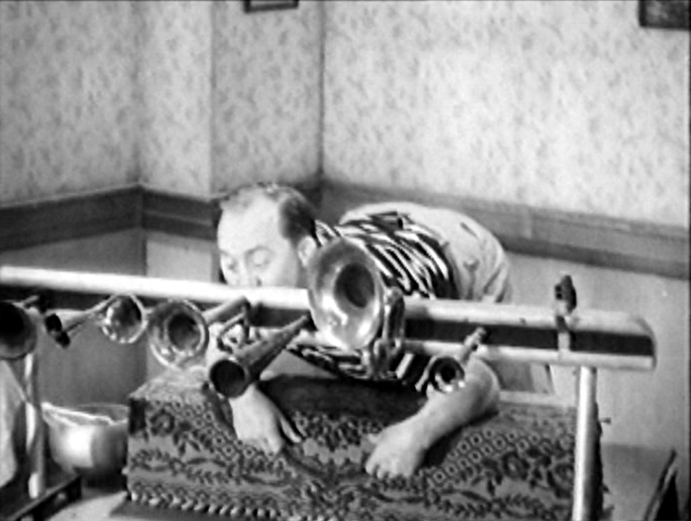 13: OLE OLSEN AND CHIC JOHNSON in ALL OVER TOWN - Republic Pictures (1937)