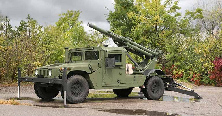 DEFENSE STUDIES: AM General Unveils 105 mm Howitzer Mounted on 4x4 Vehicle