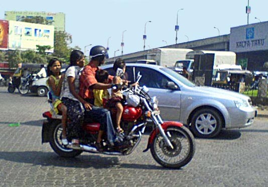 Stock Pictures: Families on two-wheelers