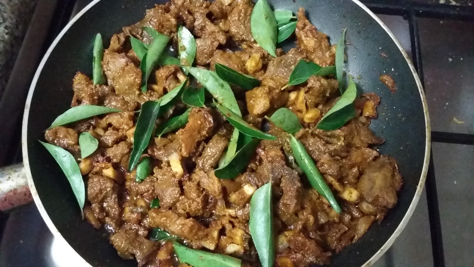 Naadan style Beef ularthu with thengakothu (Keral style Beef fry with ...