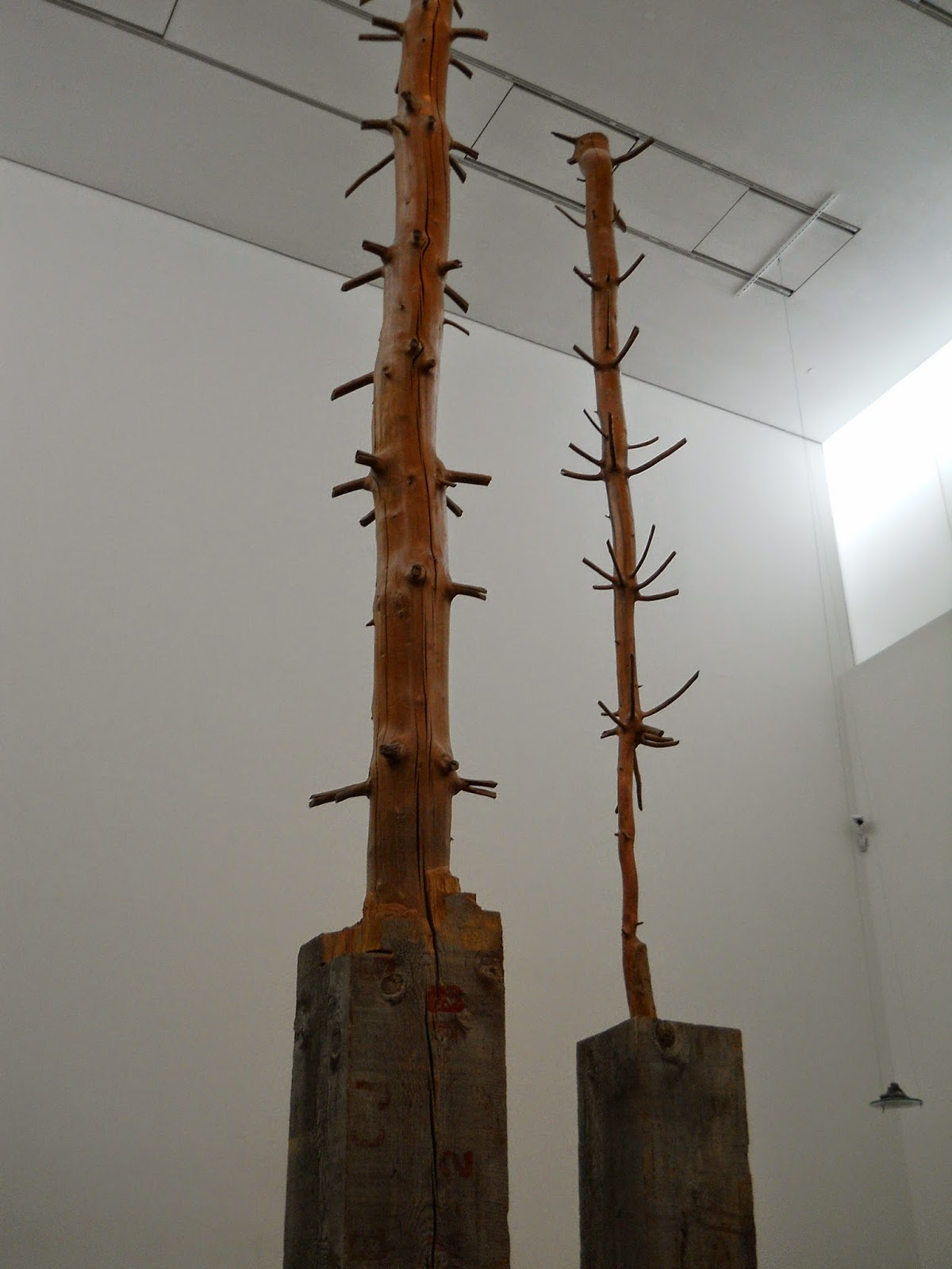 Sculptures that contrast carved areas with uncarved surfaces; The Idea ...