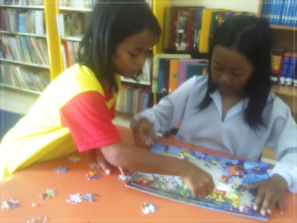 Perpustakaan Desa PNM Kg Ladang Batu: Pertandingan Susun Puzzle Berpasangan