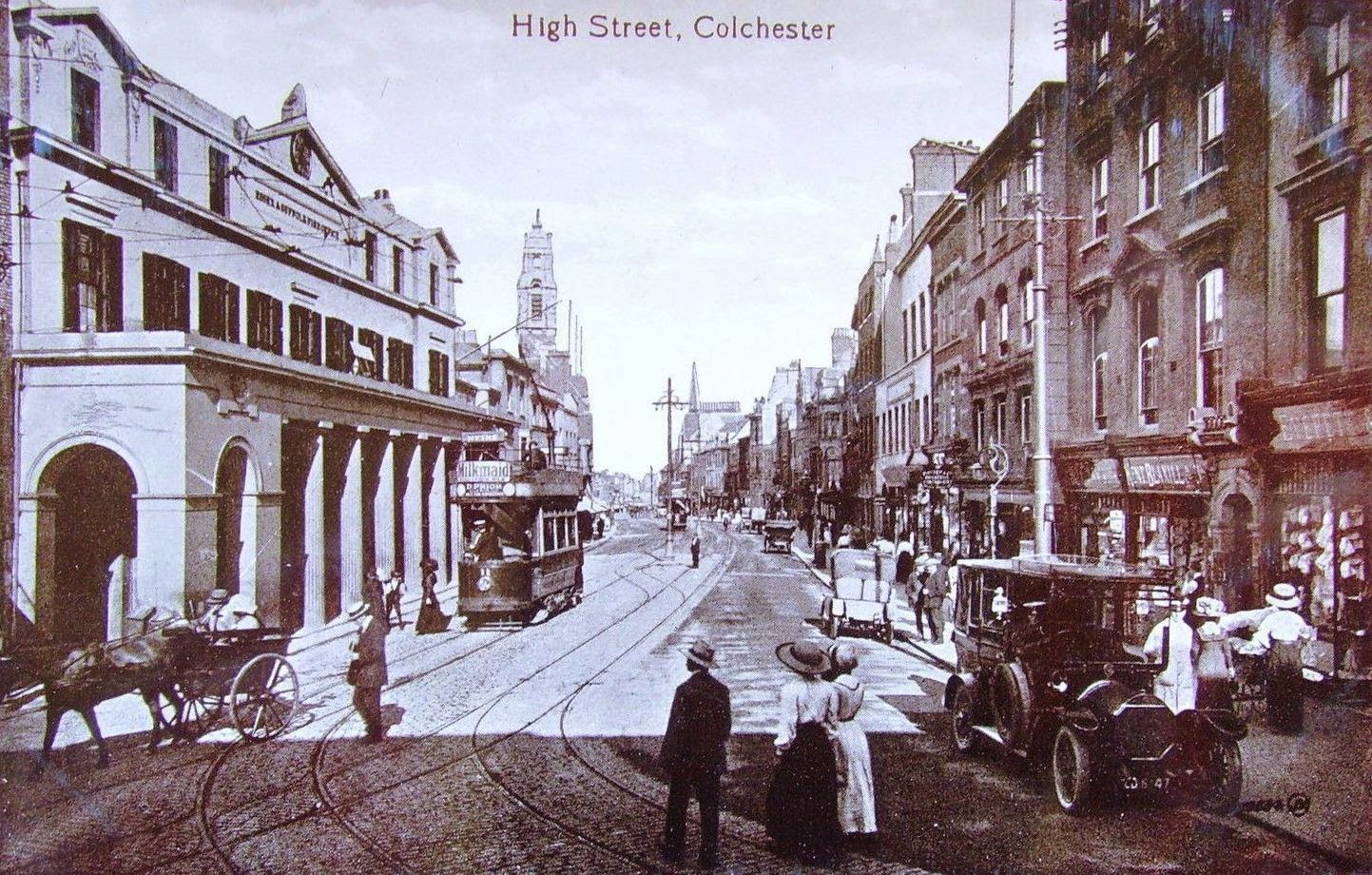 transpress nz: tram and car in High Street, Colchester, England, circa 1920