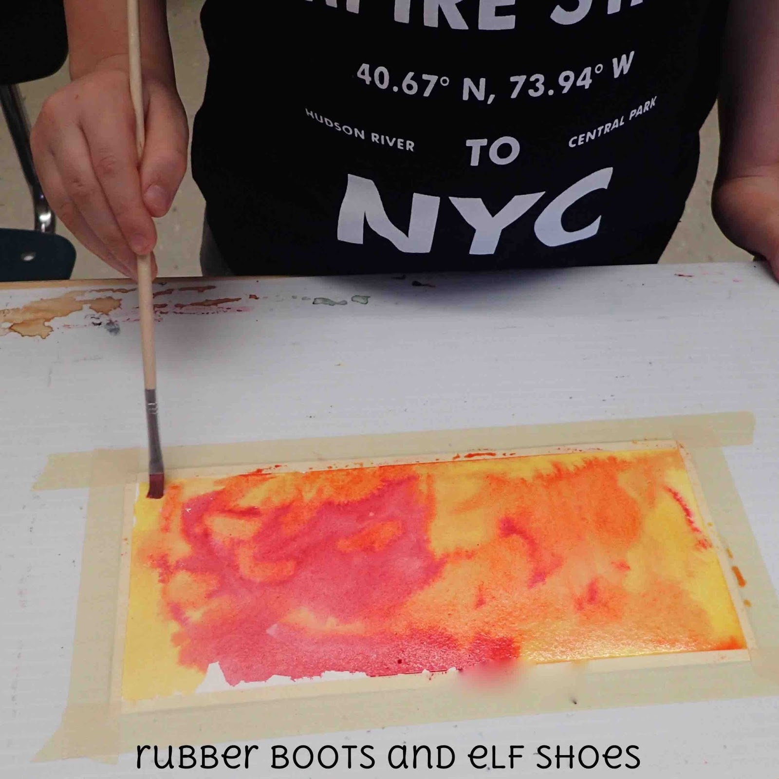 process art - painting with red and gold - rubber boots and elf shoes