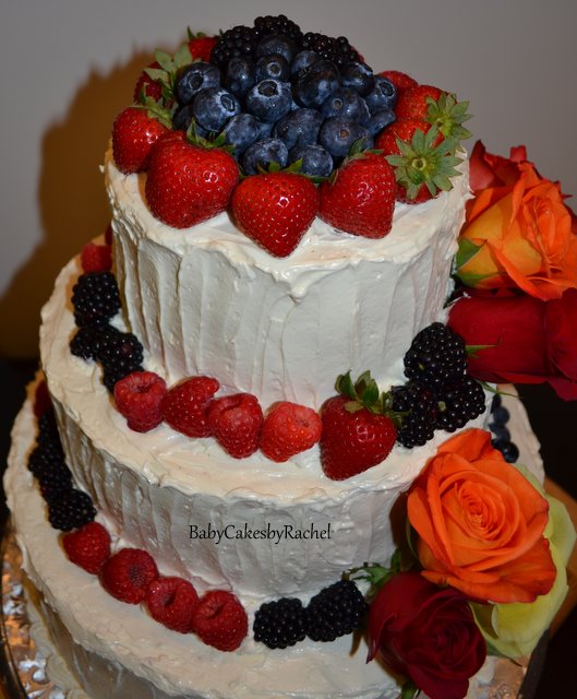BabyCakesByRachel: White Three Tiered Cake With Fresh Fruit and Flowers