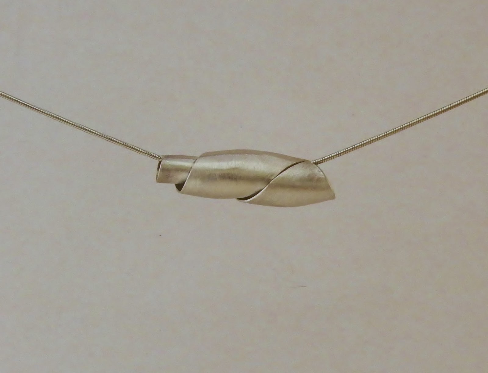 Synclastic spiral beads - made of silver