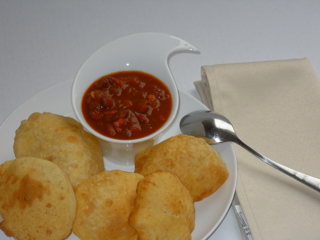 Domplines (Puerto Rican Fried bread) with stew beans
