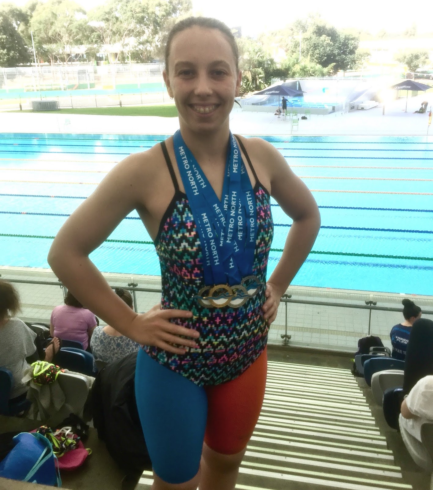 Swimming "underdog" Abbie Cooper wins three silvers and a gold