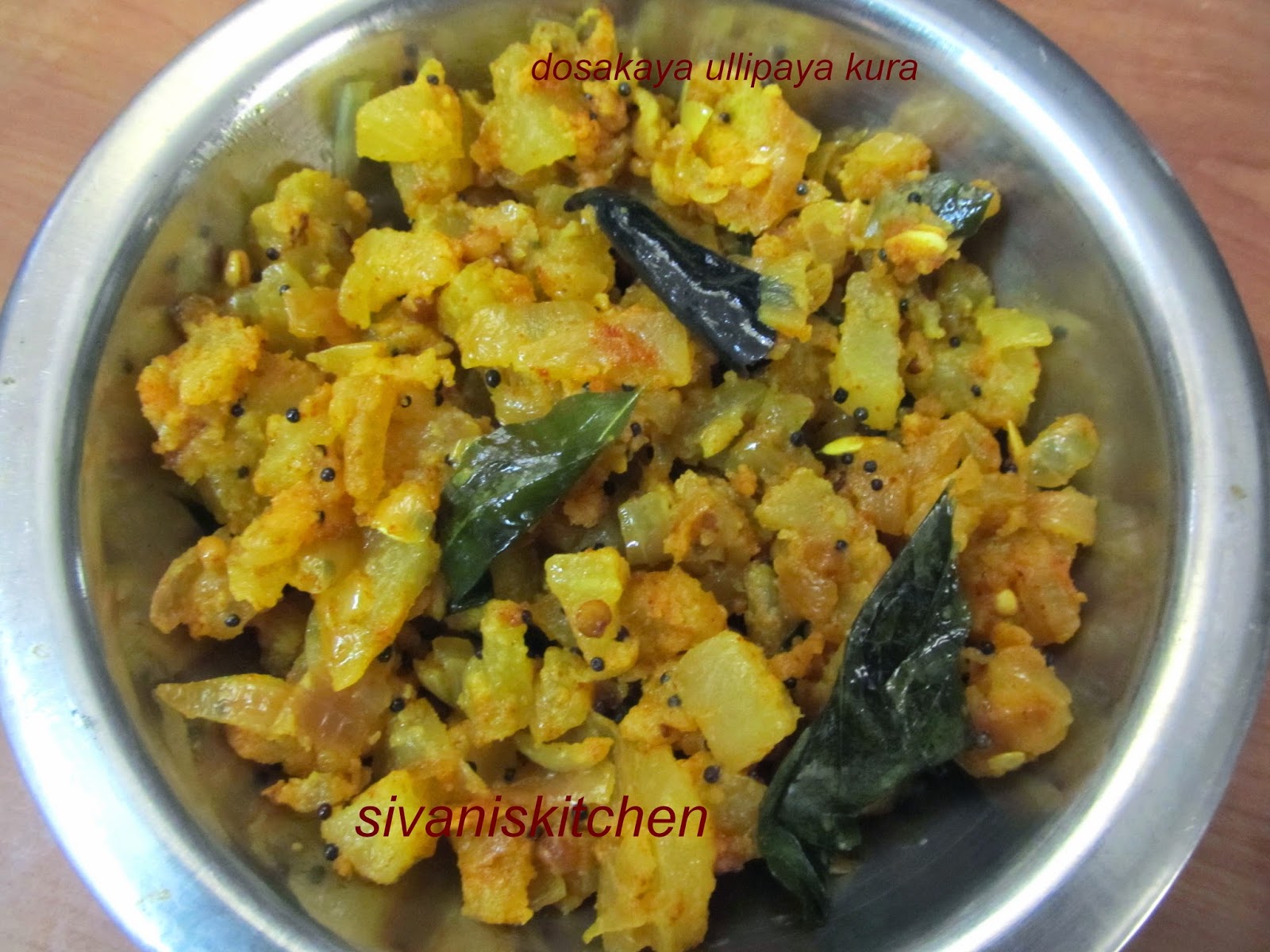 Sivani's Kitchen: Dosakaya Ullipaya Kura / Yellow Cucumber Onion Curry