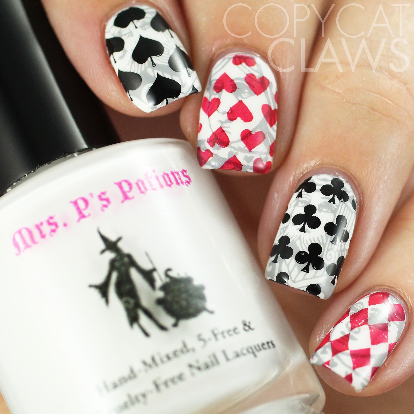 Copycat Claws: The Digit-al Dozen does Four - Card Suits